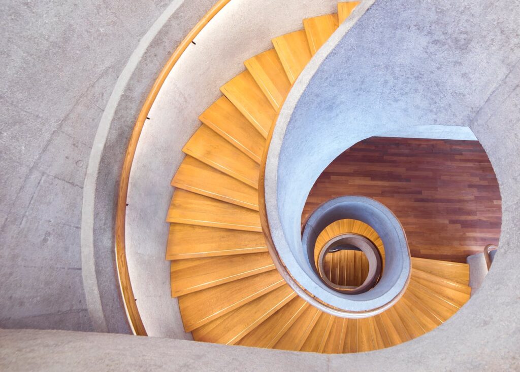 Creative Ideas on How to Use Space under Spiral Staircase - GaoboStair